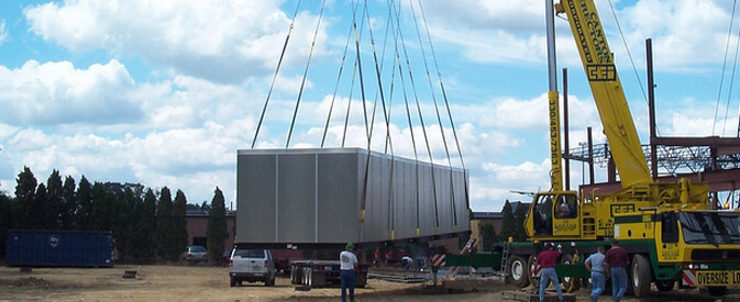 A Guide to Shipping Heavy Equipment Overseas - CEI Crane & Rigging